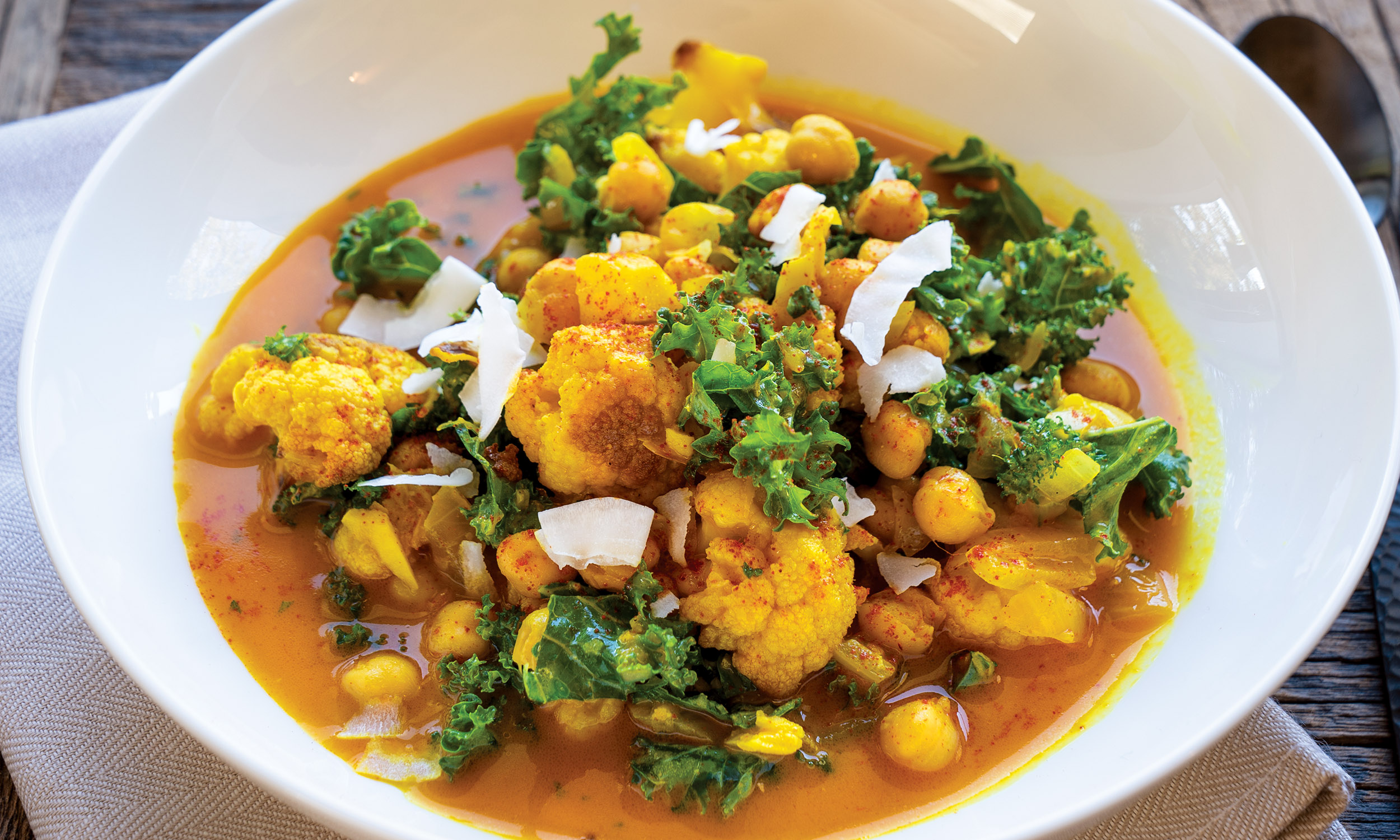 Spicy Chickpea, Chard, and Roasted Cauliflower Soup - Delicious Living